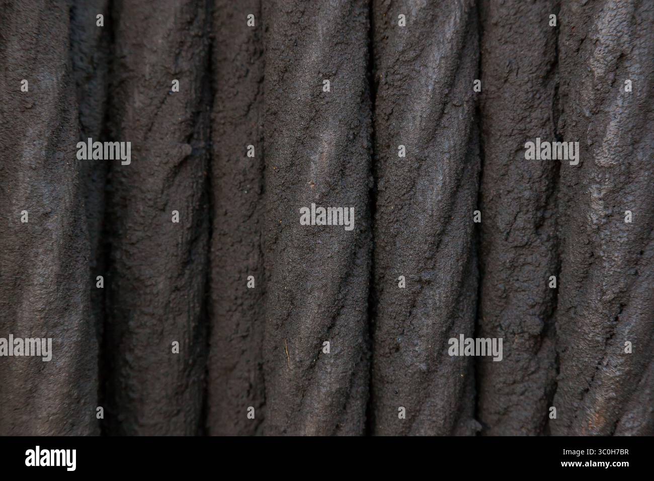 Steel cable lubricated with grease, close-up Stock Photo - Alamy