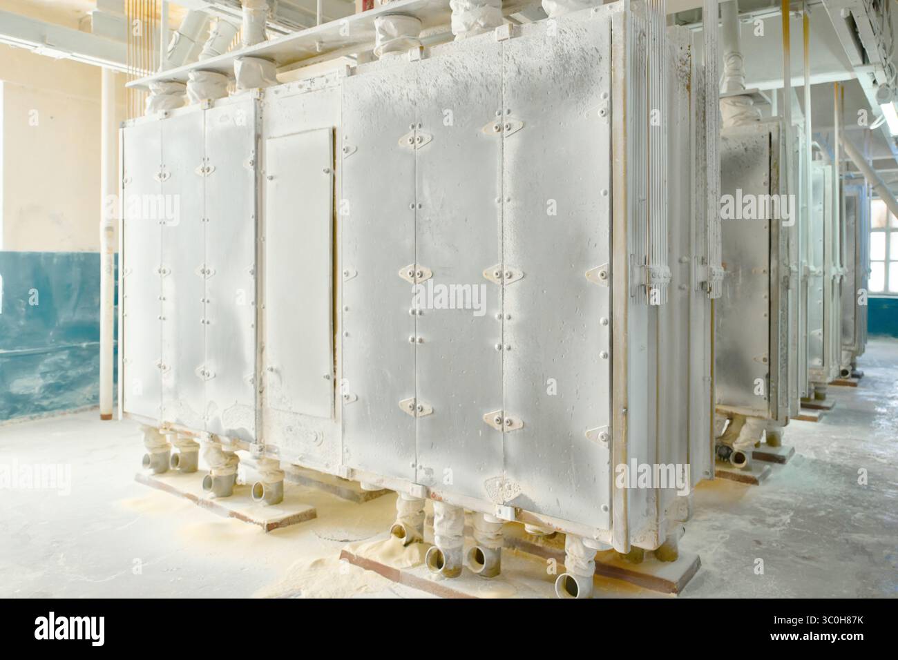Flour sieving and grading machines in action at a wheat flour mill ...