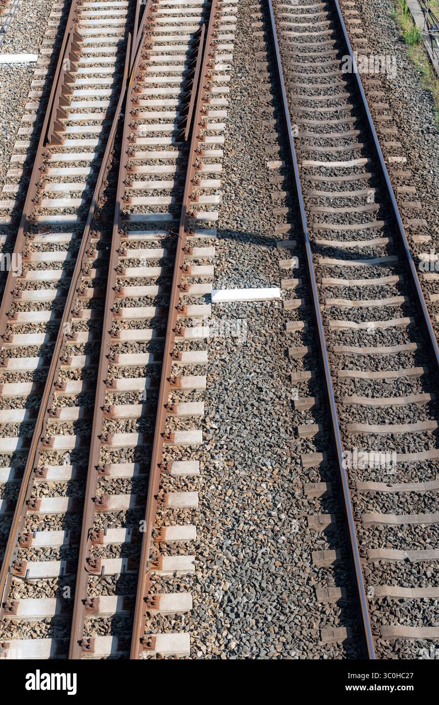 angle and image filling view of multiple railroad tracks with railroad ...