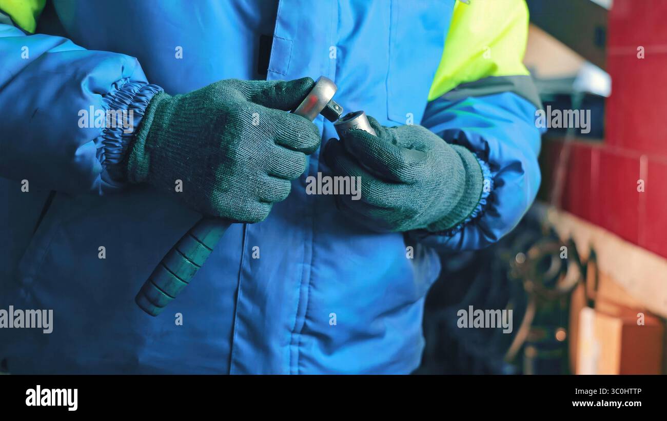 Close up gloved hand attaching hi-res stock photography and images - Alamy