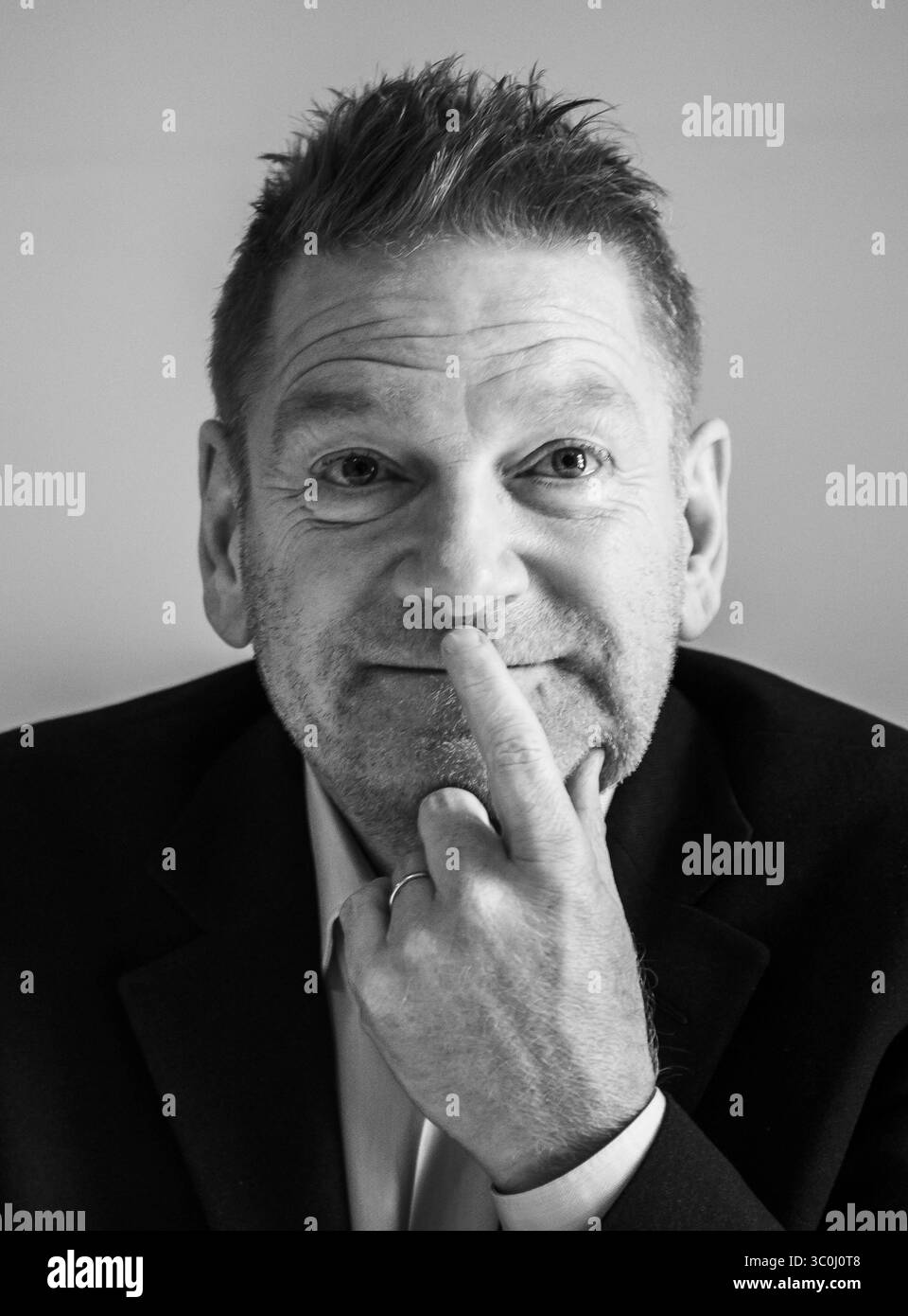 Portrait eye contact actor blue suit Black and White Stock Photos ...