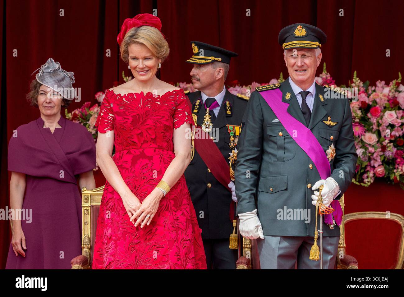 Belgium's King Philippe and Queen Mathilde watch the official military ...
