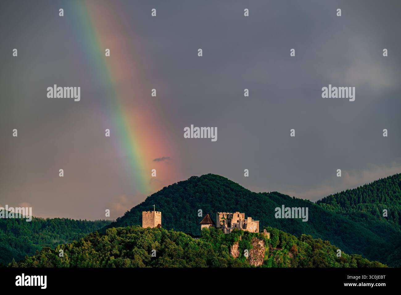 Rainbow over Old castle Celje Stock Photo - Alamy