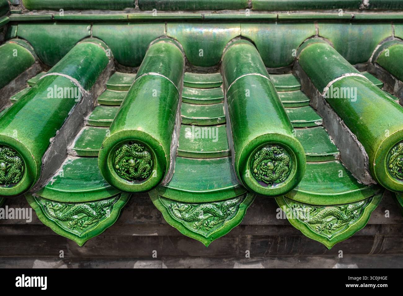 Traditional Chinese roof tiles background, old green glazed ceramic ...