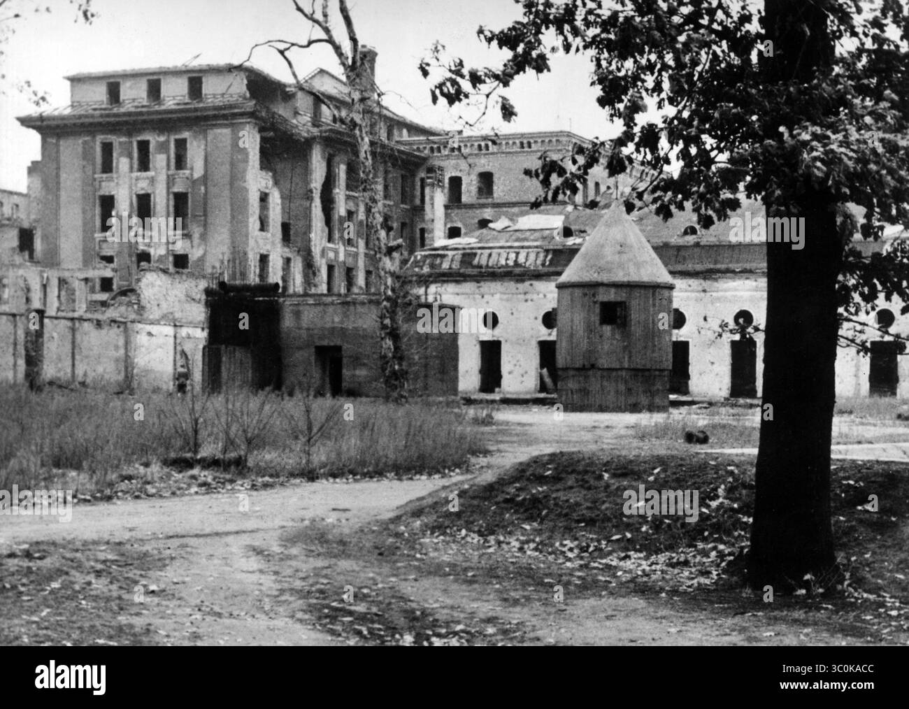 The ruins of the Chancellery Palace, of the entrance to the bunker and ...