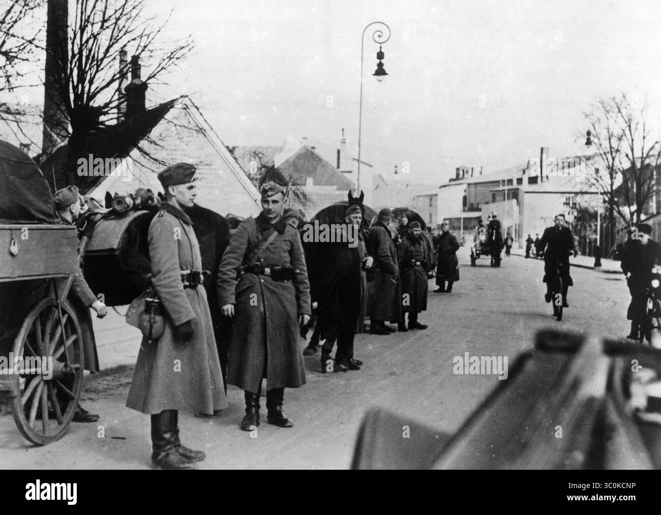 A column of German army tanks carrying the supplies for the troops in ...