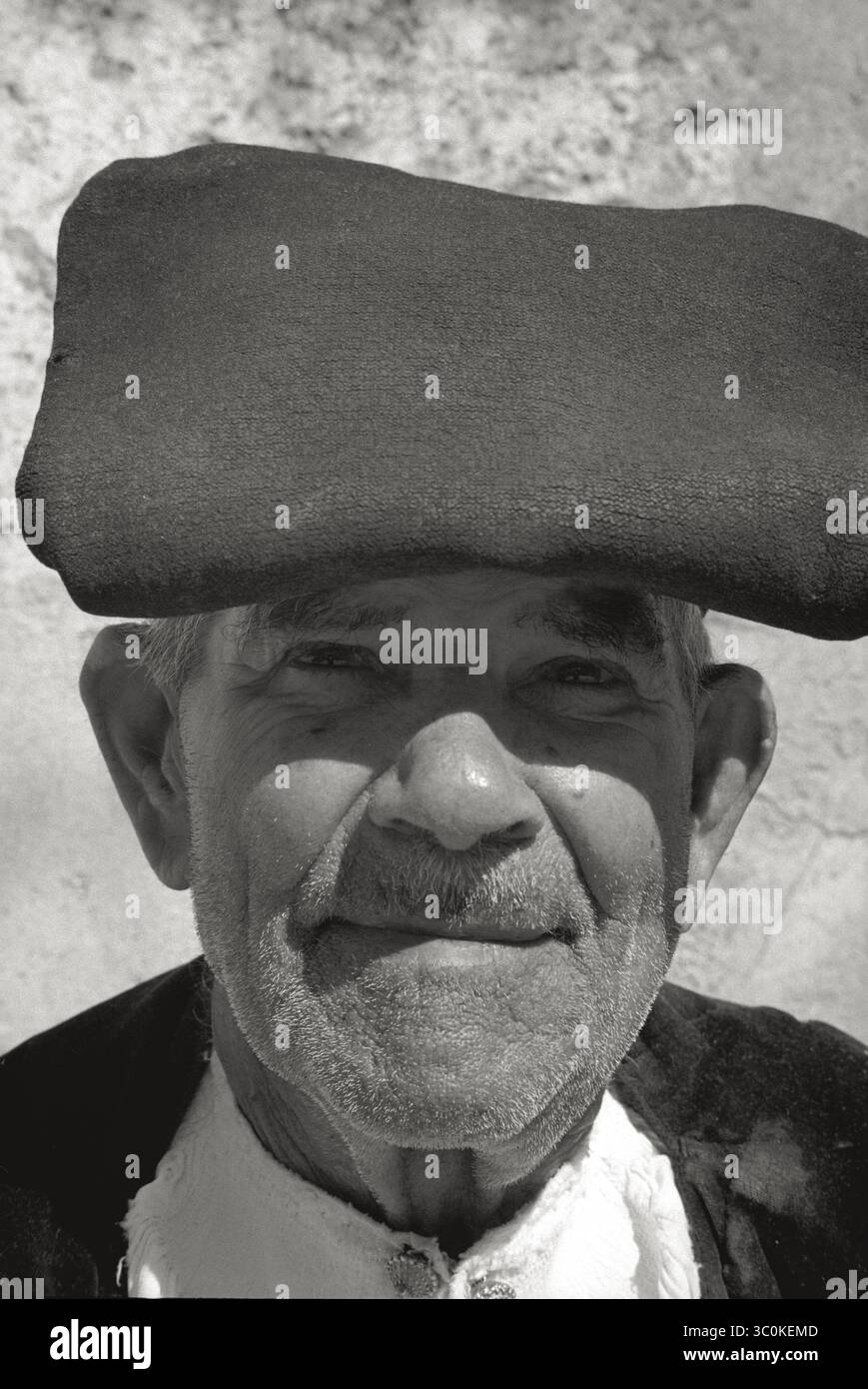 Close up of an old Sardinian shepherd who is wearing traditional ...