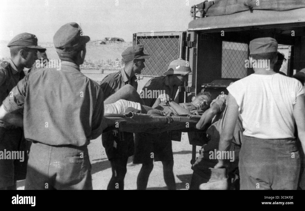 A wounded German soldier is evacuated from the area of Sollum and ...