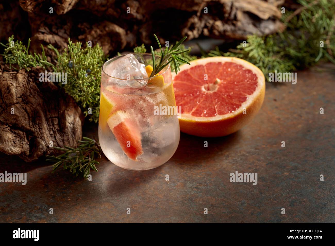 Refreshing hard seltzer with ice, grapefruit, and rosemary. Light ...
