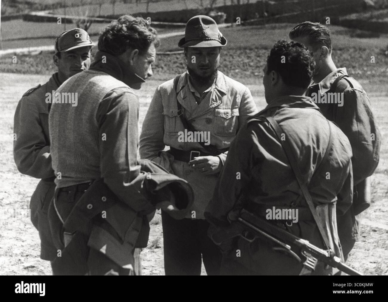 A group of partisan chiefs near Alba, during a meeting; in the center ...