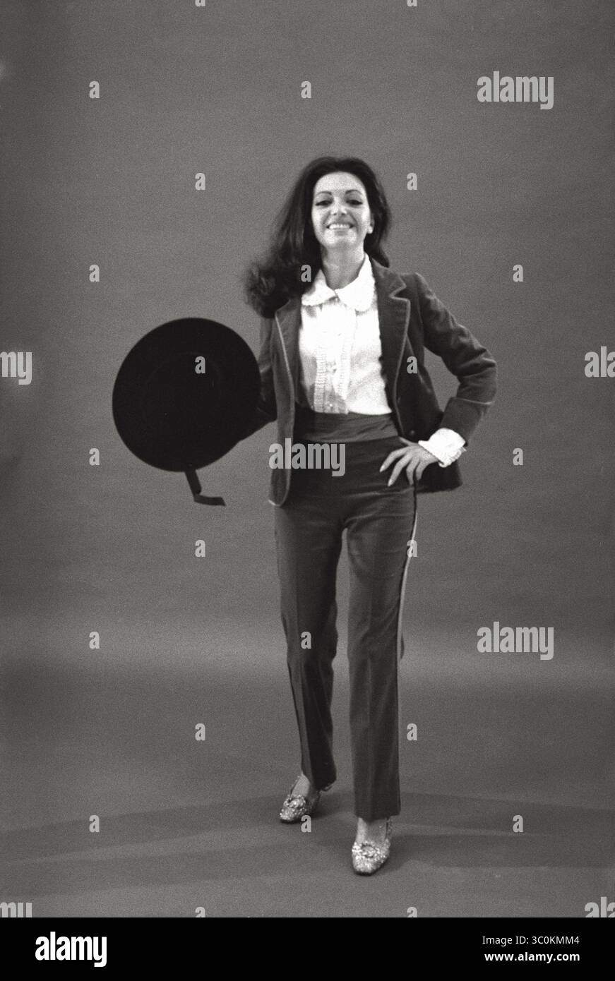 The Italian actress Bedy Moratti posing for a portrait wearing a hat ...