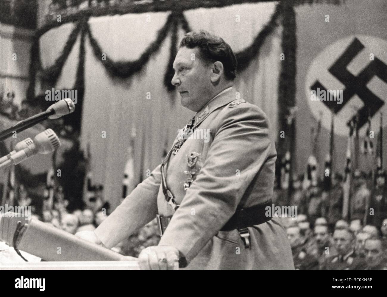 The marshal of the Reich Hermann Goering at the microphone on the stage ...