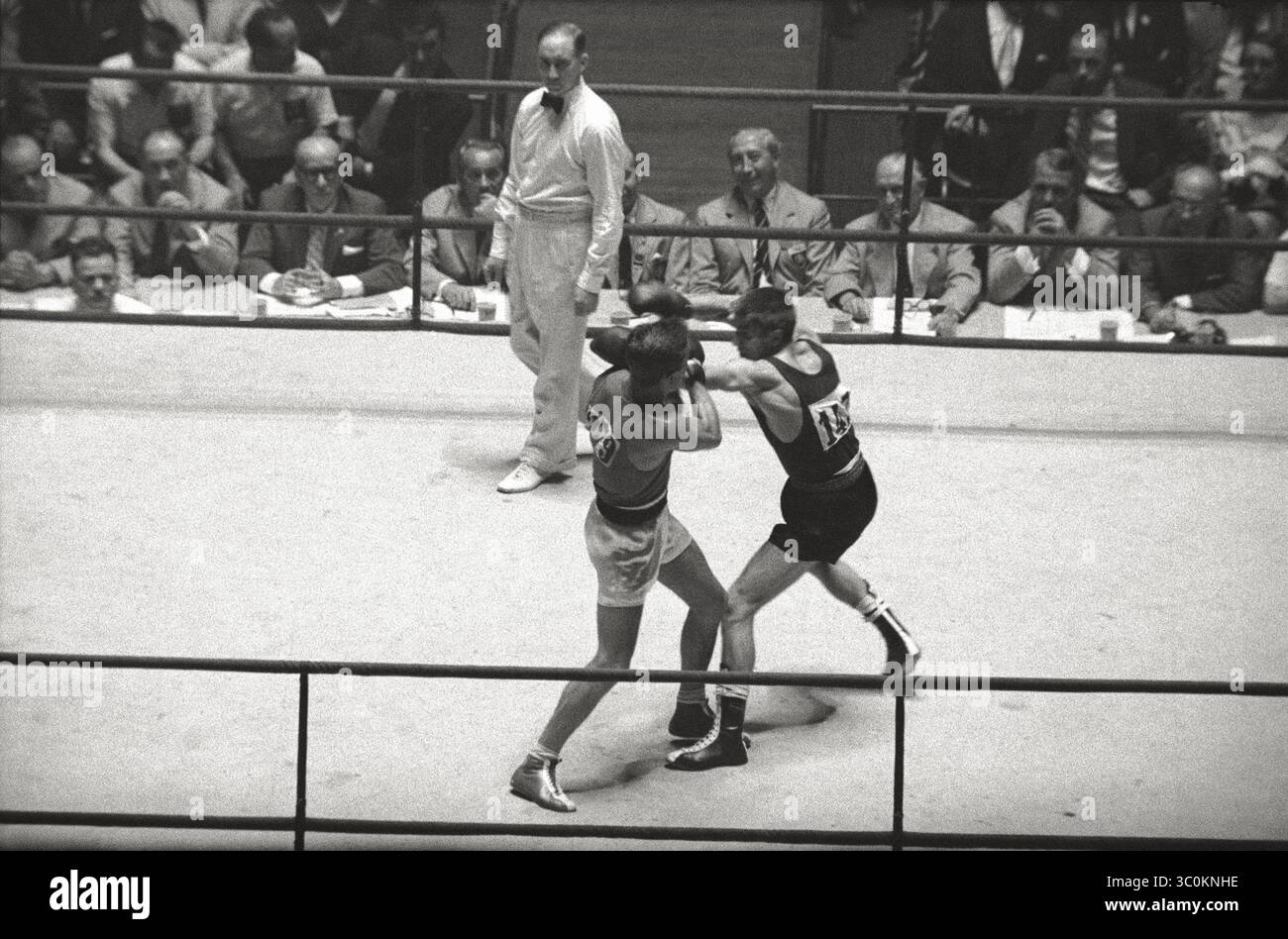 The Italian boxer Nino Benvenuti defeating Soviet boxer Yuri Radonyak ...