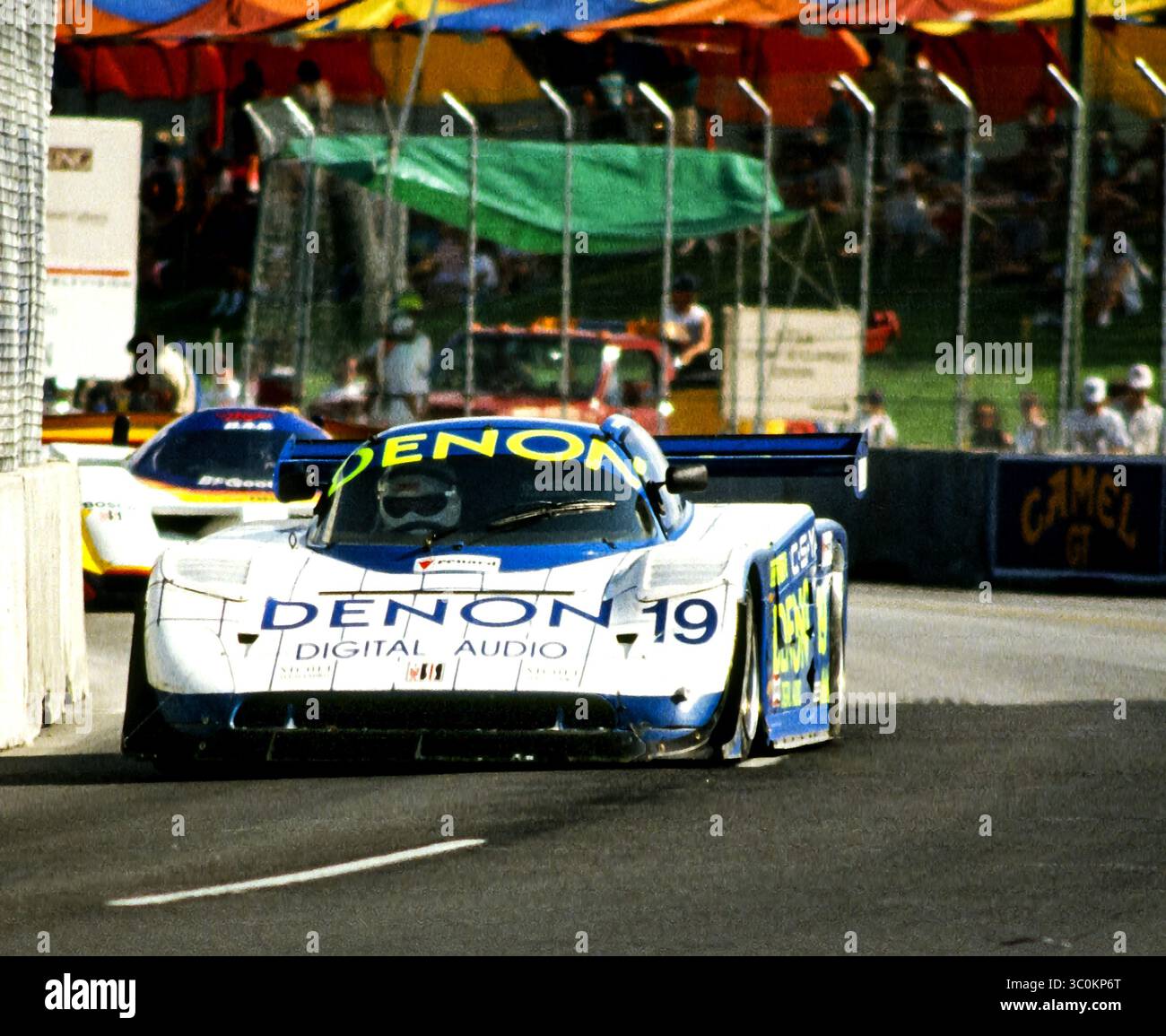 Denon-liveried IMSA GTP race car navigating Turn 8 during the 3-hour ...