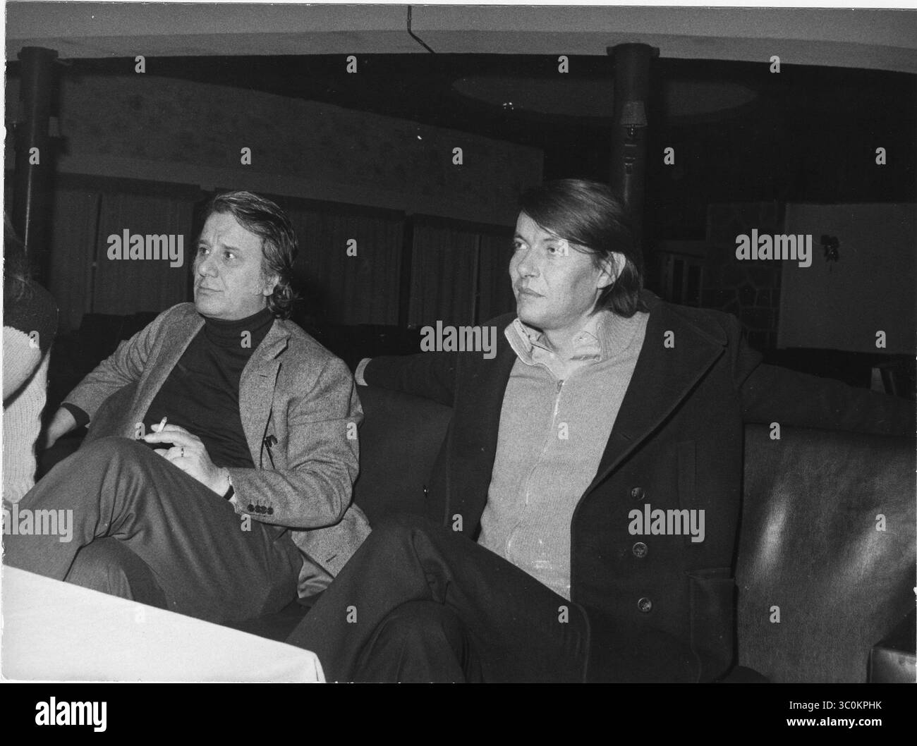 The Italian singer-songwriter Fabrizio De Andre sitting next to Sergio ...