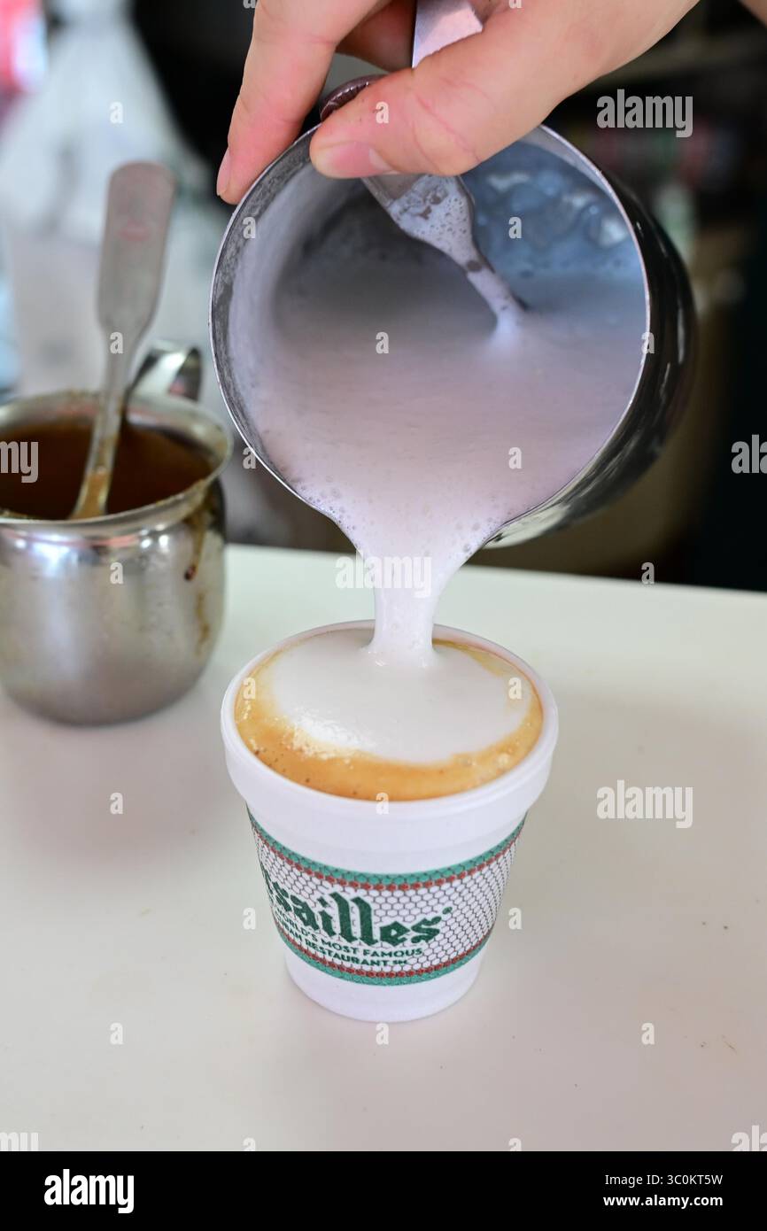 Miami, USA. 19th July, 2025. A barista is preparing a Cafecito, which ...
