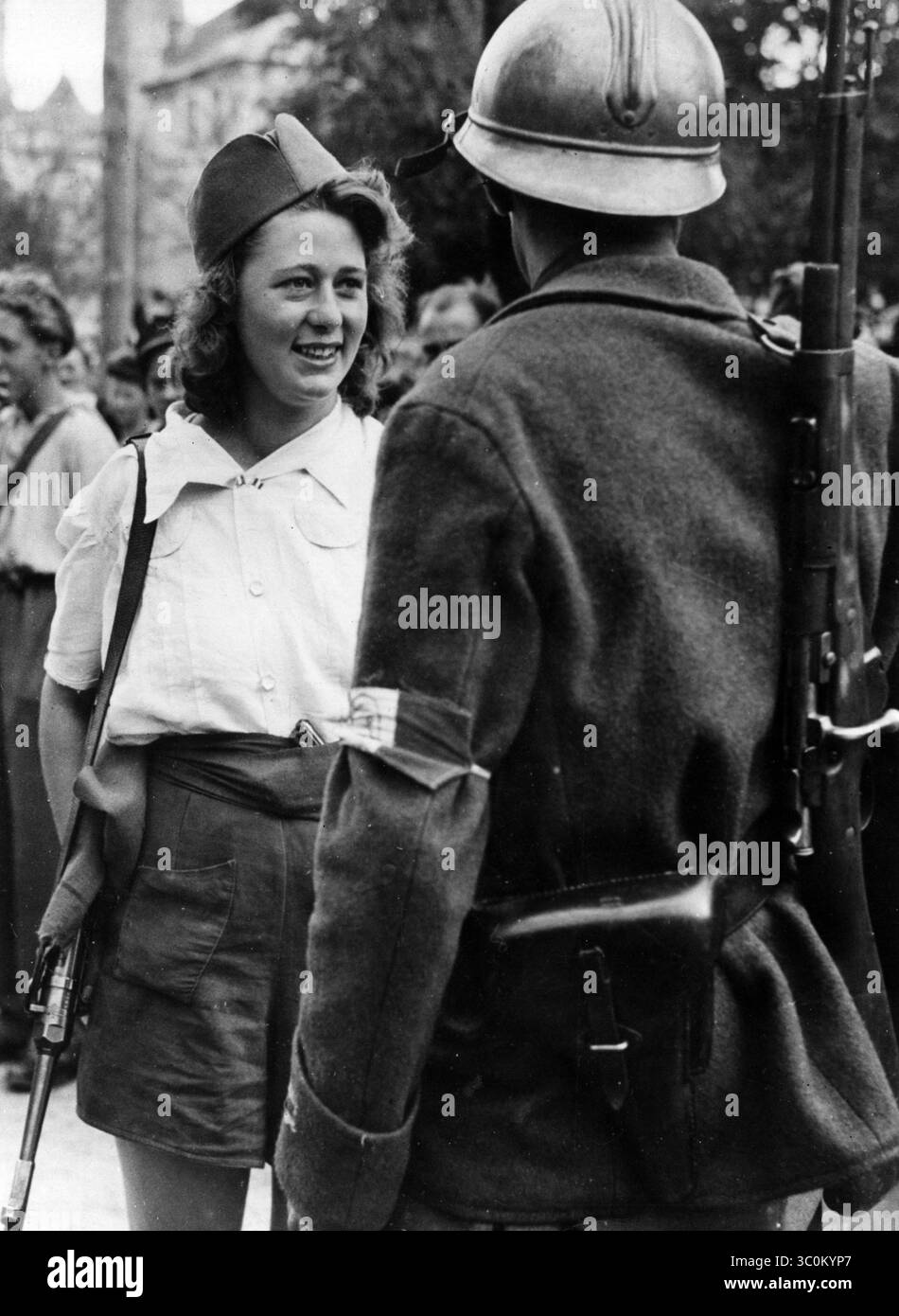A partisan talking to a French officer after the liberation of Chartres ...