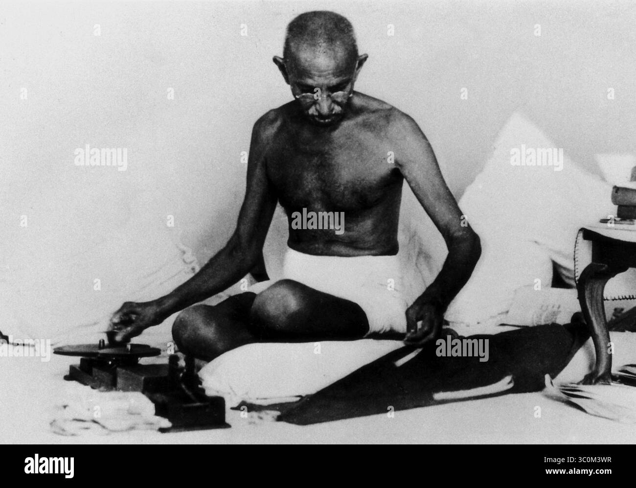 The Mahatma Gandhi spinning the Indian typical fabric called 'khadi' by ...