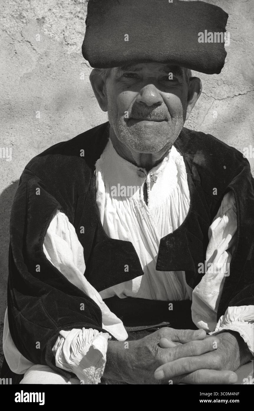 Close up of an old Sardinian shepherd who is wearing the traditional ...