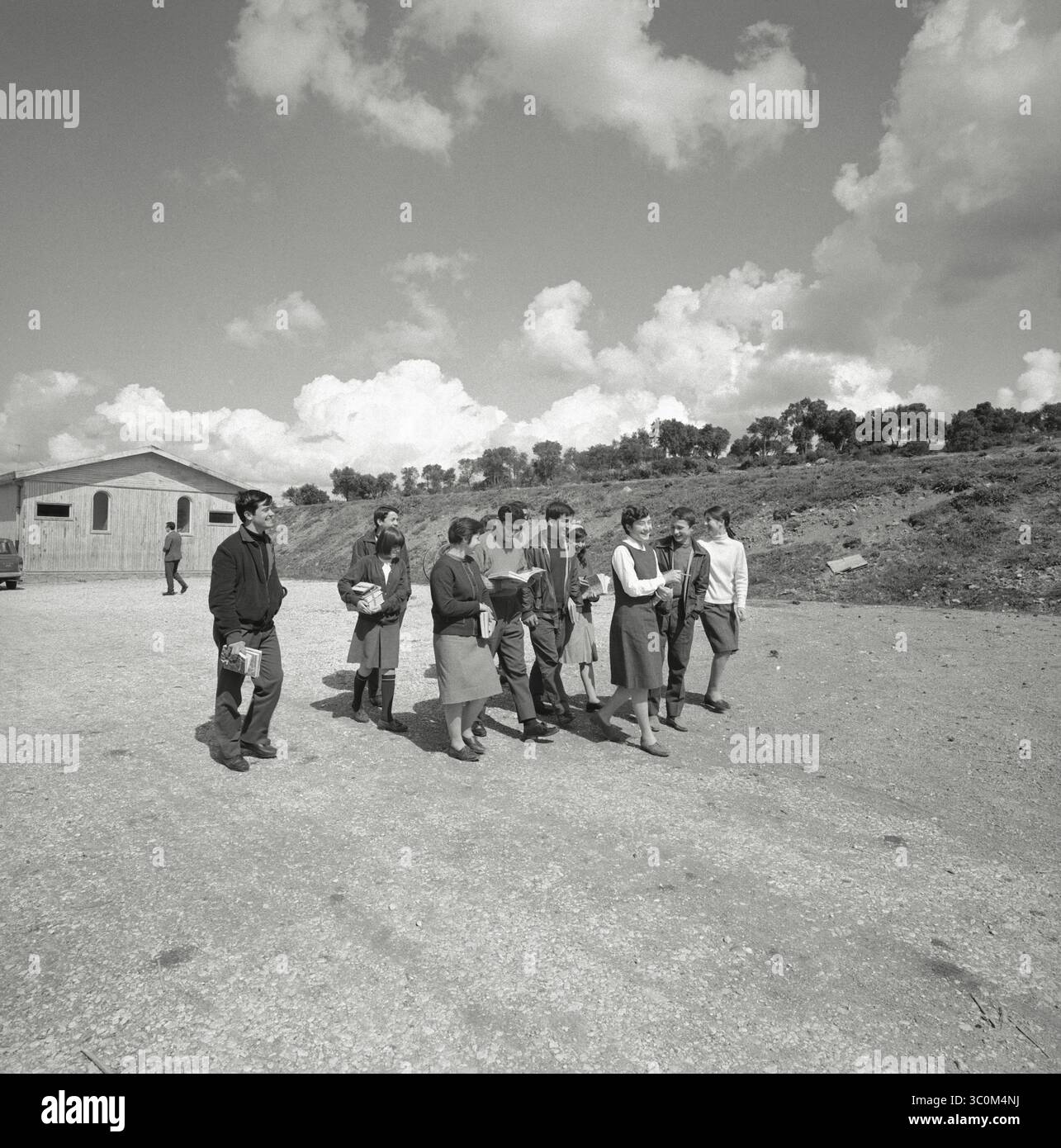 A group of Italian young people in the Nomadelfia community having a moment of relaxation ...