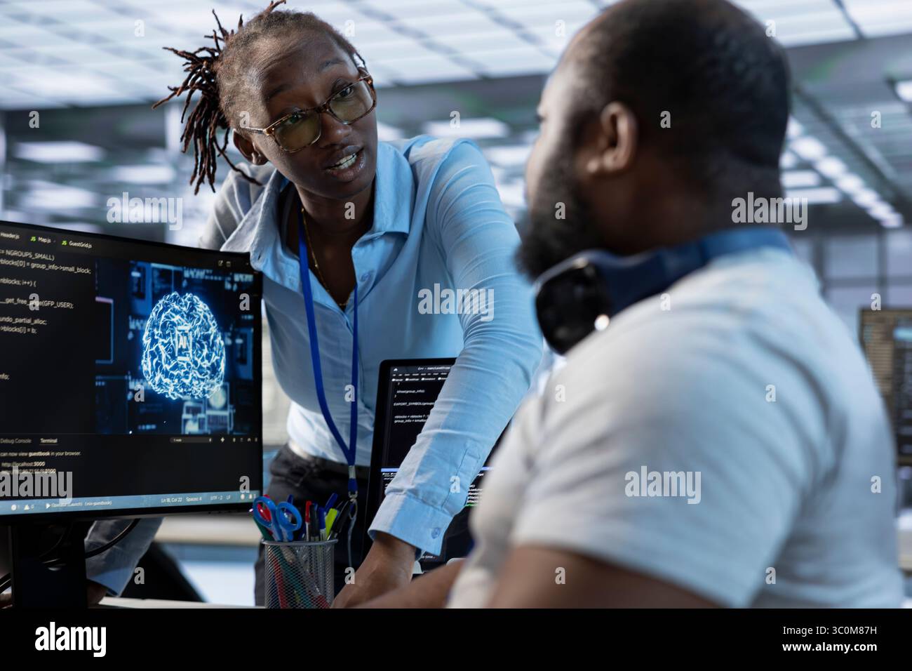 Manager admonishing AI programmer after making error damaging high tech ...