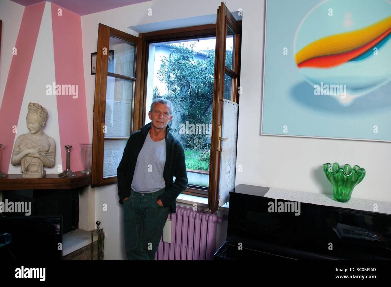 The writer Aldo Busi photographed at home in Montichiari after he came ...