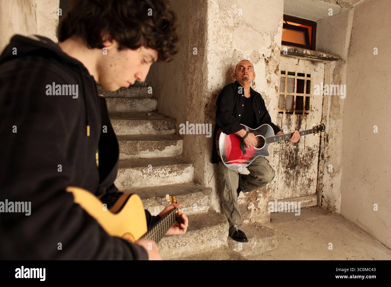 The singer-songwriter Mango, Giuseppe Mango's stage name, with his son ...