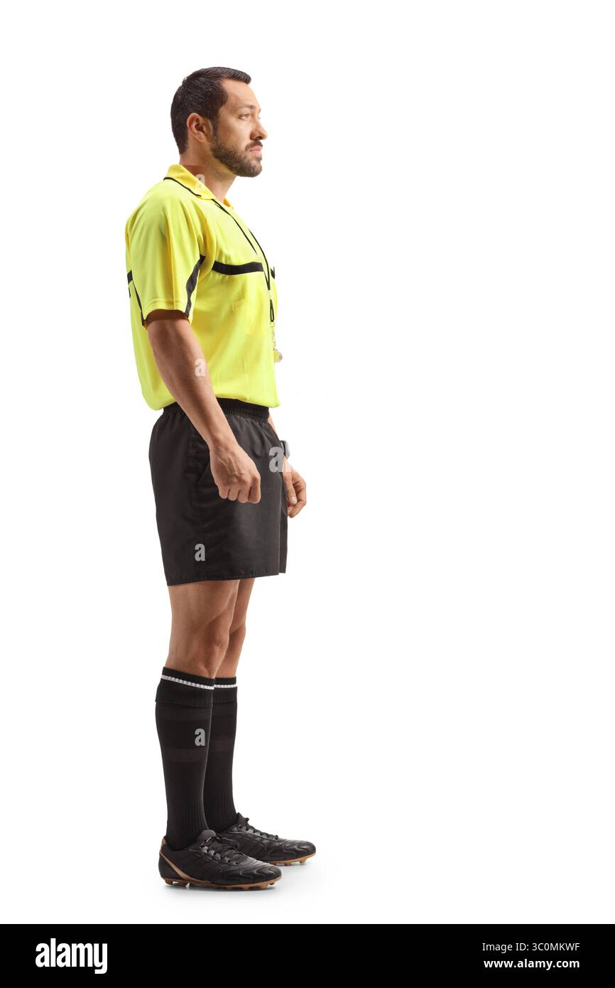 Full length shot of a referee standing isolated on white background ...