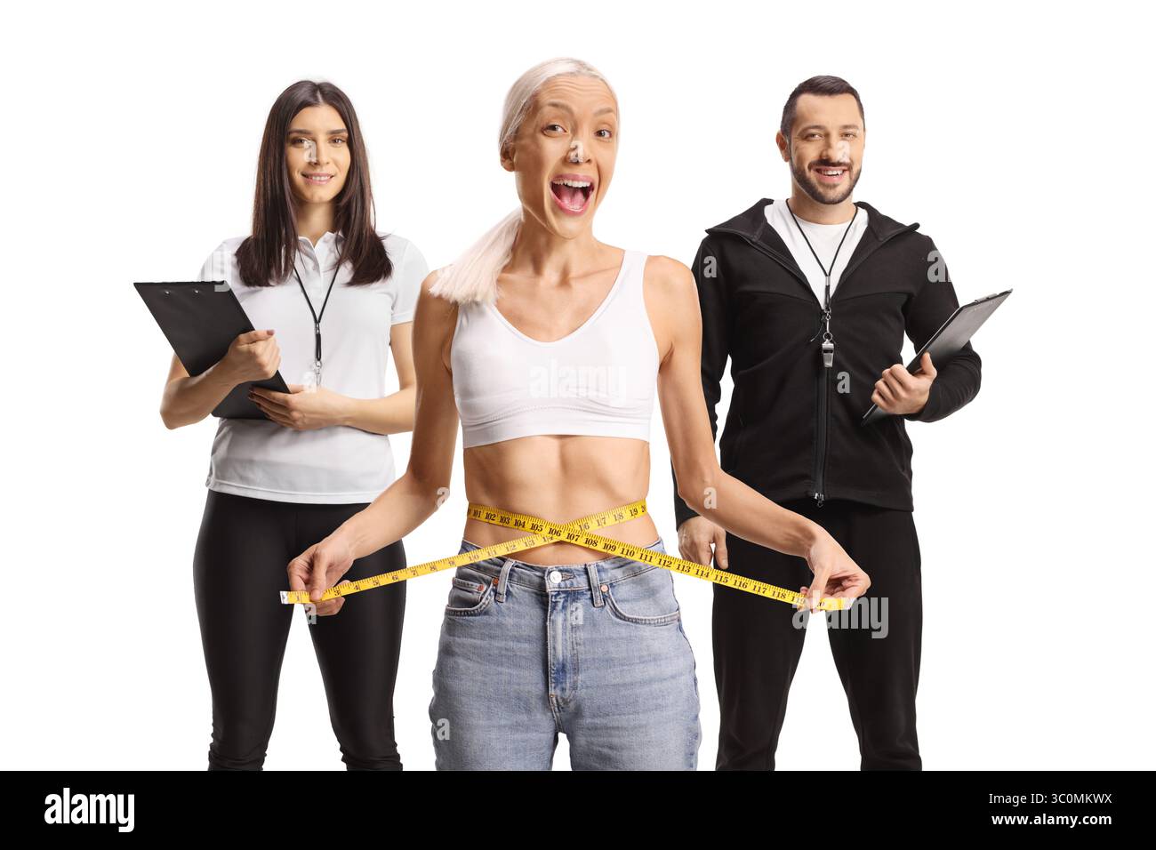 Young slim woman with personal fitness coaches isolated on white ...