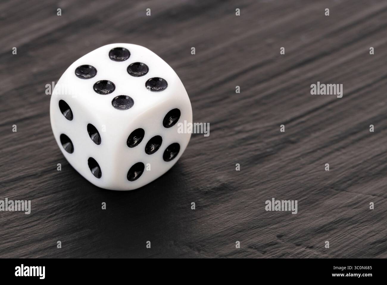 one board game dice - White die with black dots Stock Photo - Alamy