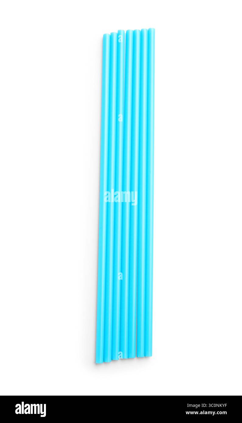 Blue plastic straws on white background Stock Photo - Alamy