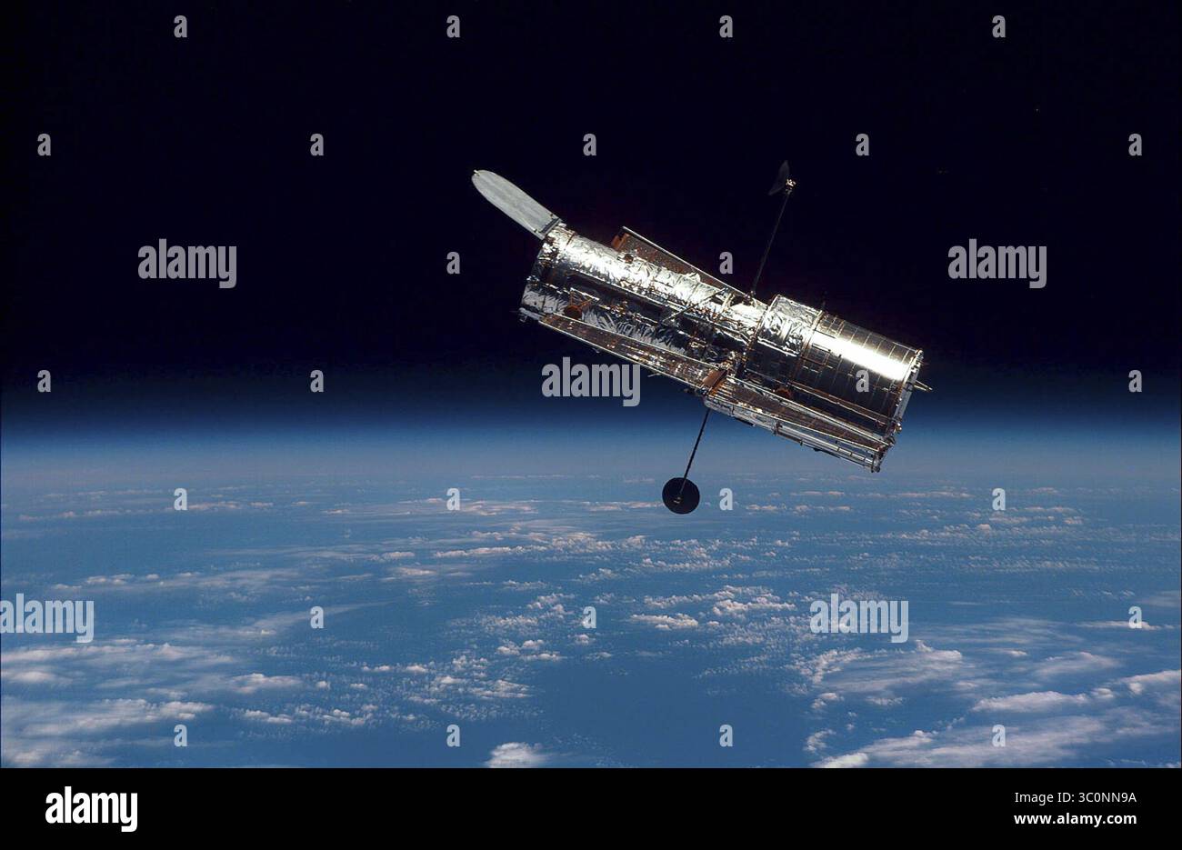 December 9, 1993 - Sts-61, EARTH ORBIT - The Hubble Space Telescope floats away from the Space ...