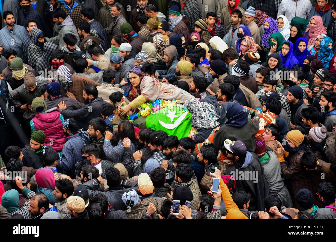 December 10, 2018 - Thousands of mourners carry the body of alleged rebels Mudasir Parray, 14 ...