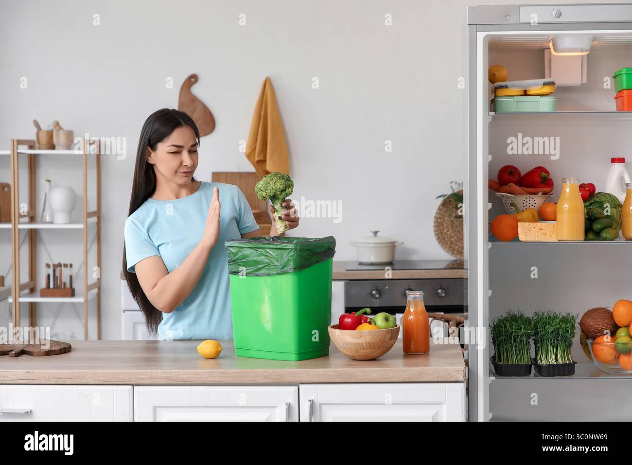 Beautiful woman throwing spoiled hi-res stock photography and images ...