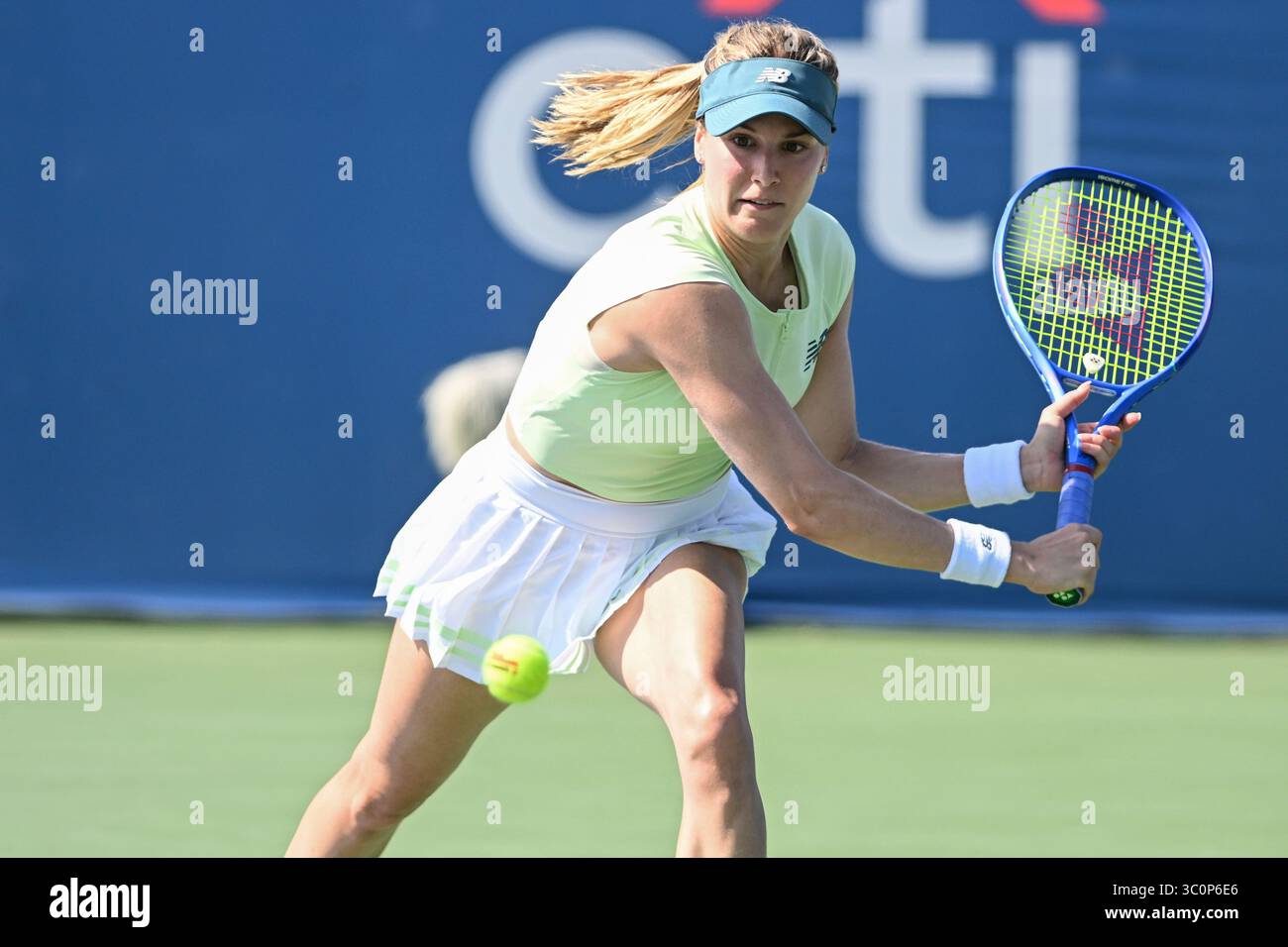 July 21, 2025, Washington, D.C, U.S: EUGENIE BOUCHARD hits a backhand during her doubles match ...