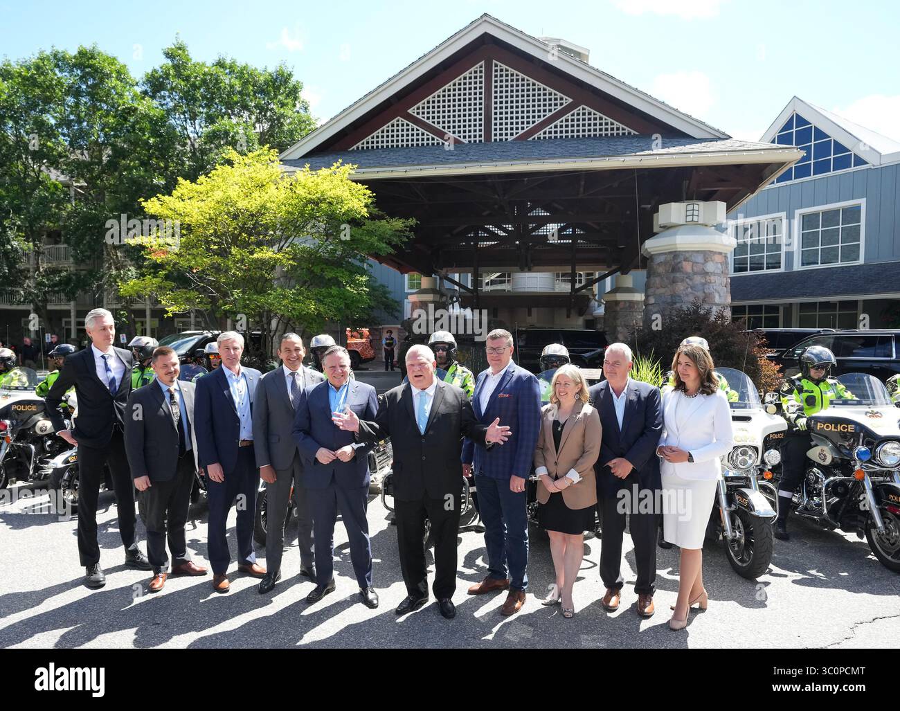 Ontario Premier Doug Ford, centre, welcomes the premiers as they pose ...