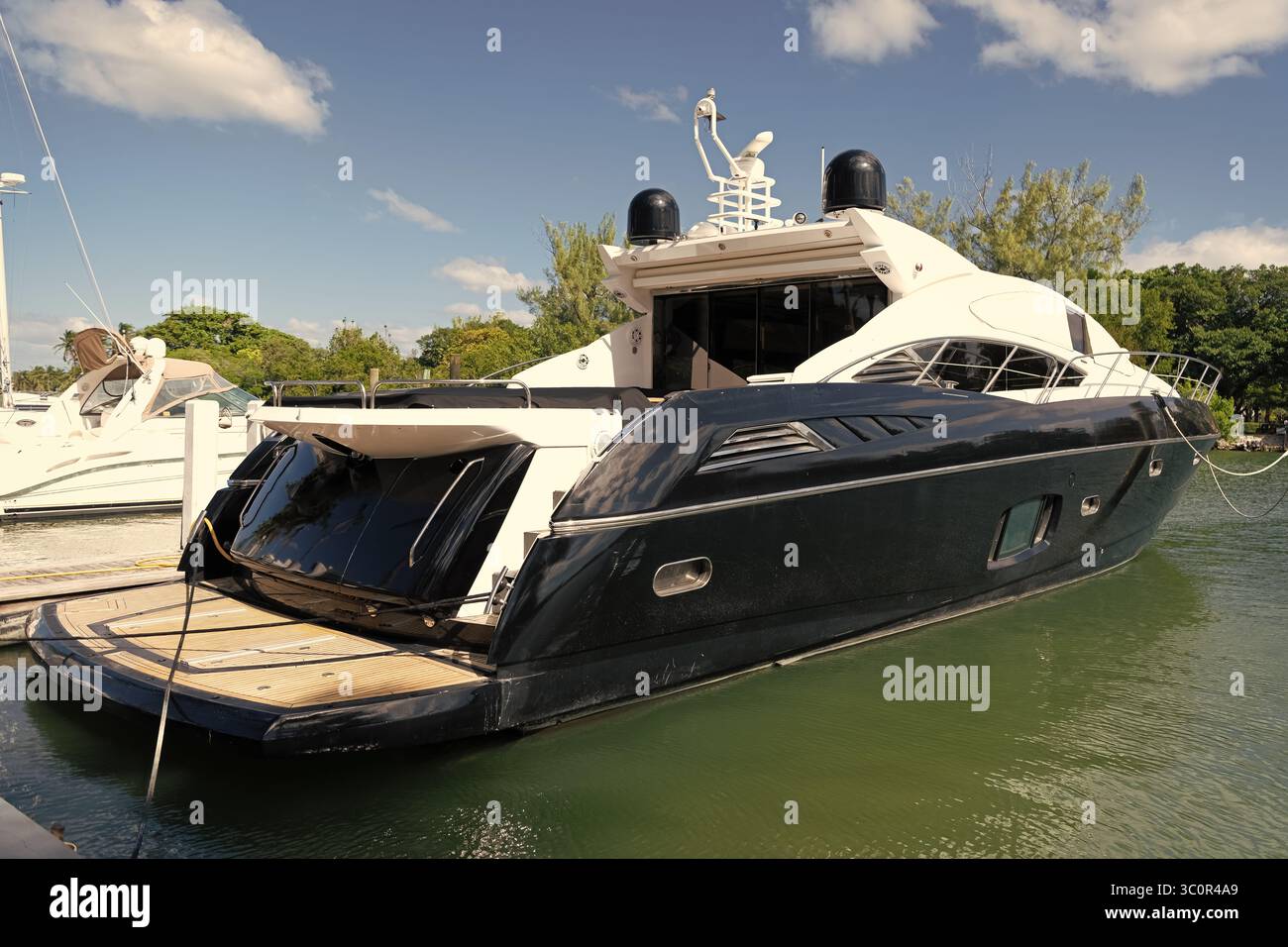 Vacation in summertime. Docked yacht at private area. Boat trip. Sea ...