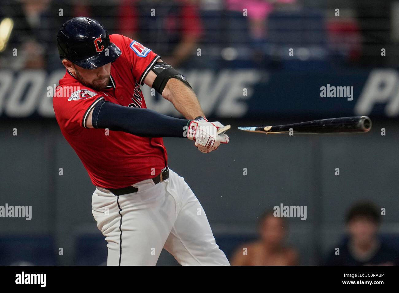 Cleveland Guardians' David Fry breaks his bat on a ball hit for a ...