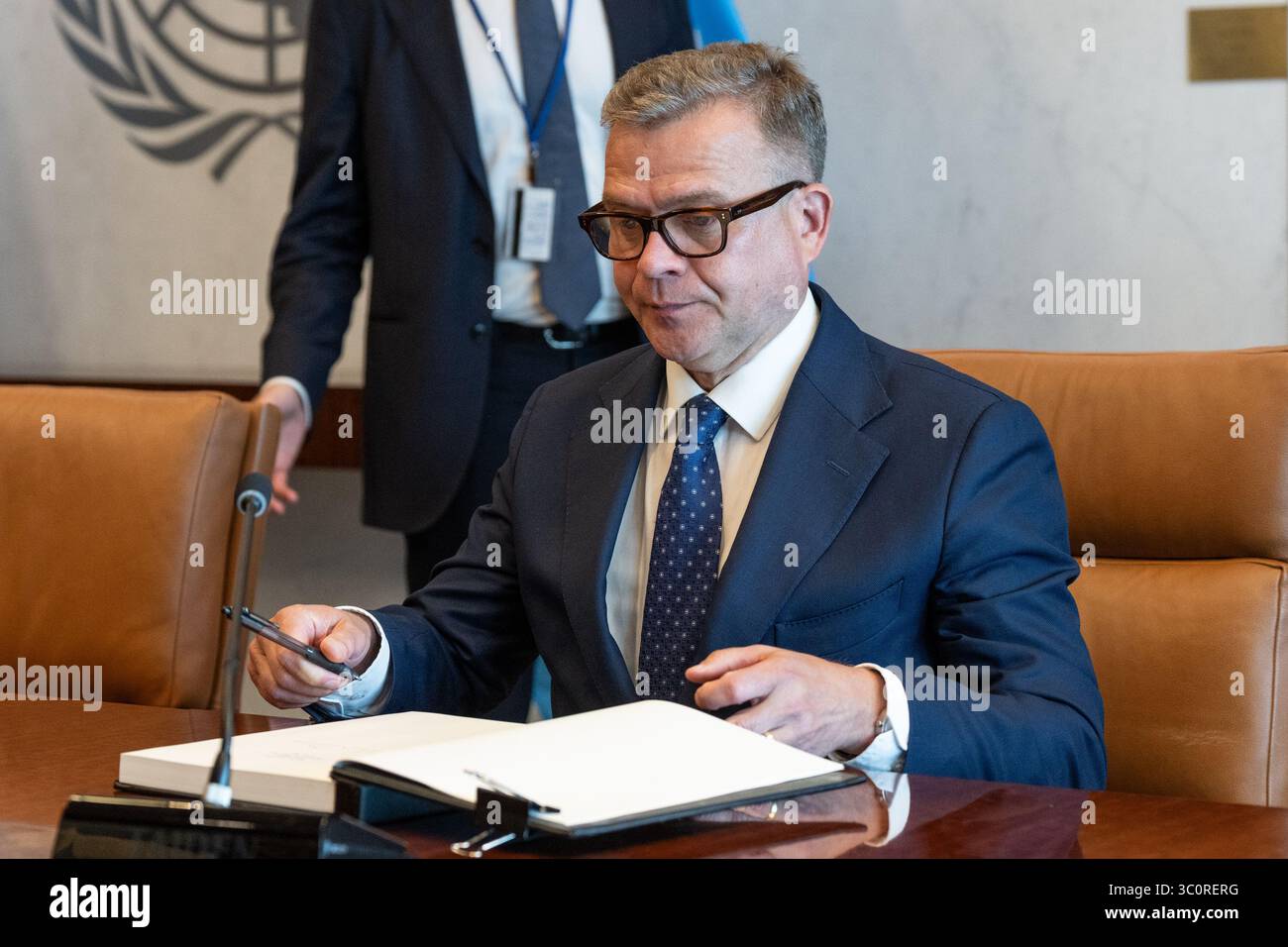 Petteri Orpo, Prime Minister of Finland signs guest book at the meeting with UN Secretary ...