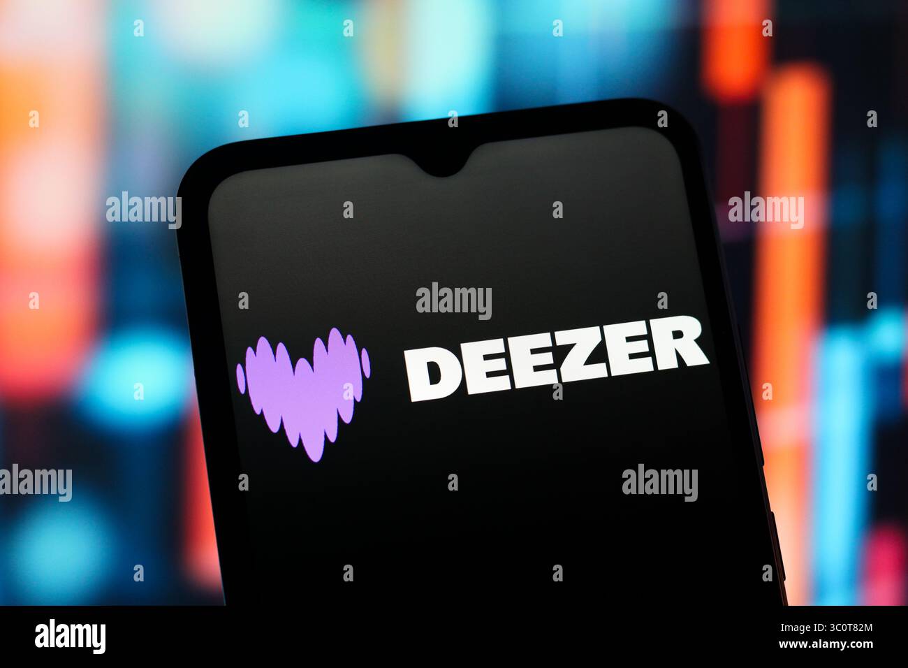 In this photo illustration, the Deezer logo is seen displayed on a ...