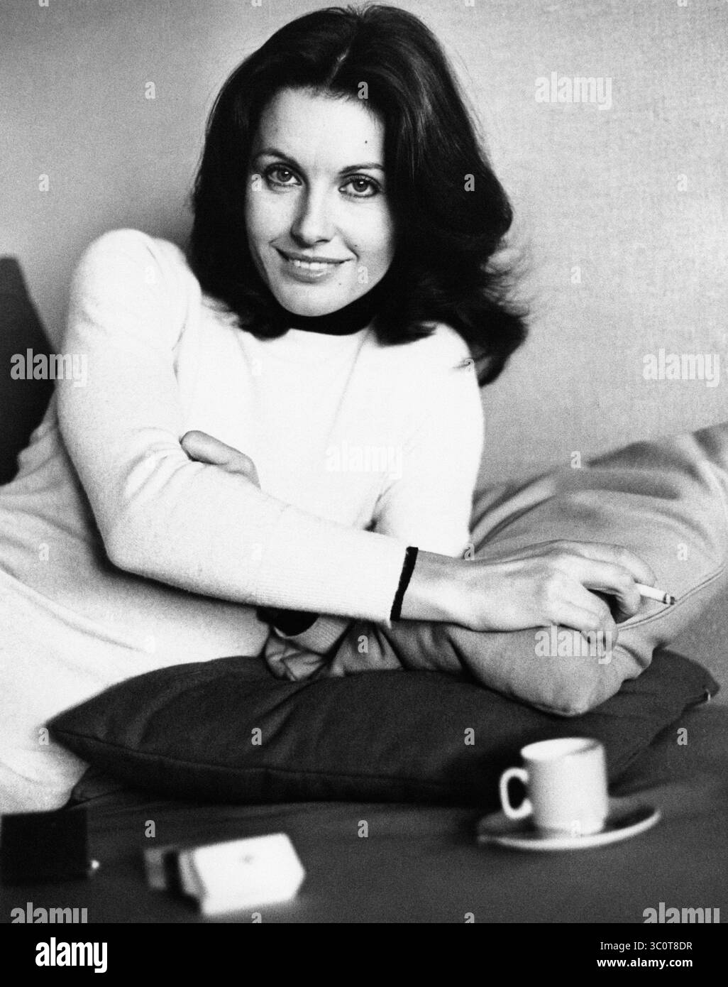 Italian television presenter and actress Gabriella Farinon smoking a ...