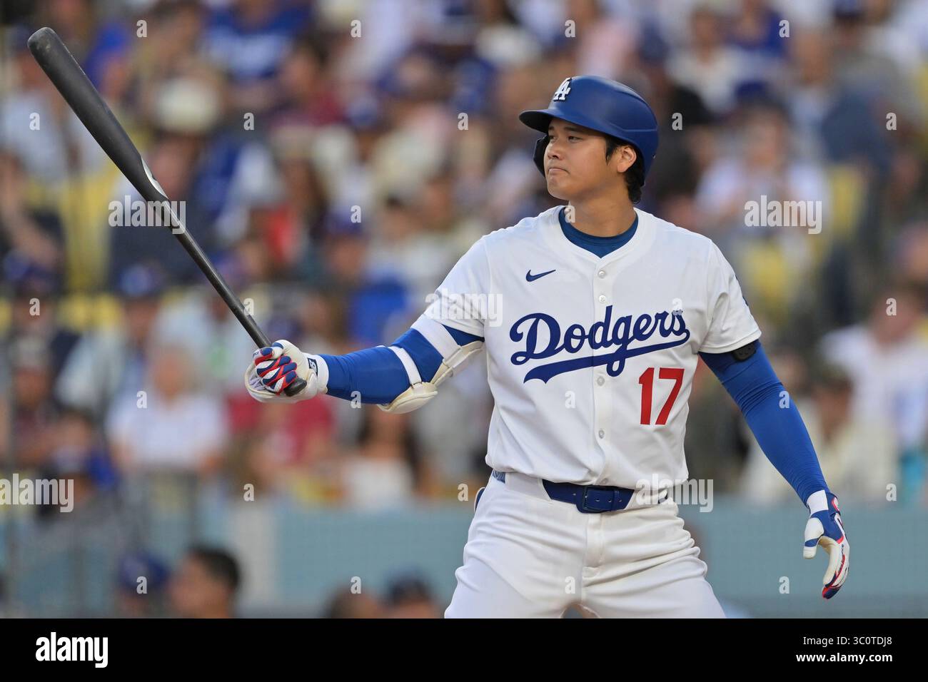 Los Angeles Dodgers' Shohei Ohtani bats against the Minnesota Twins during the first inning of a ...