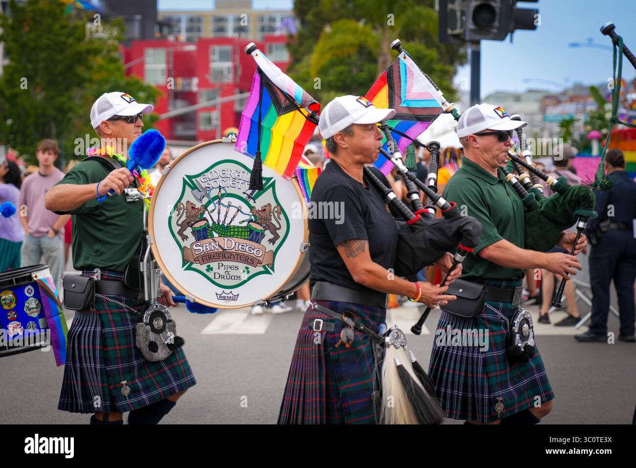 The San Diego Firefighters' Pipes and Drums band marches proudly at ...