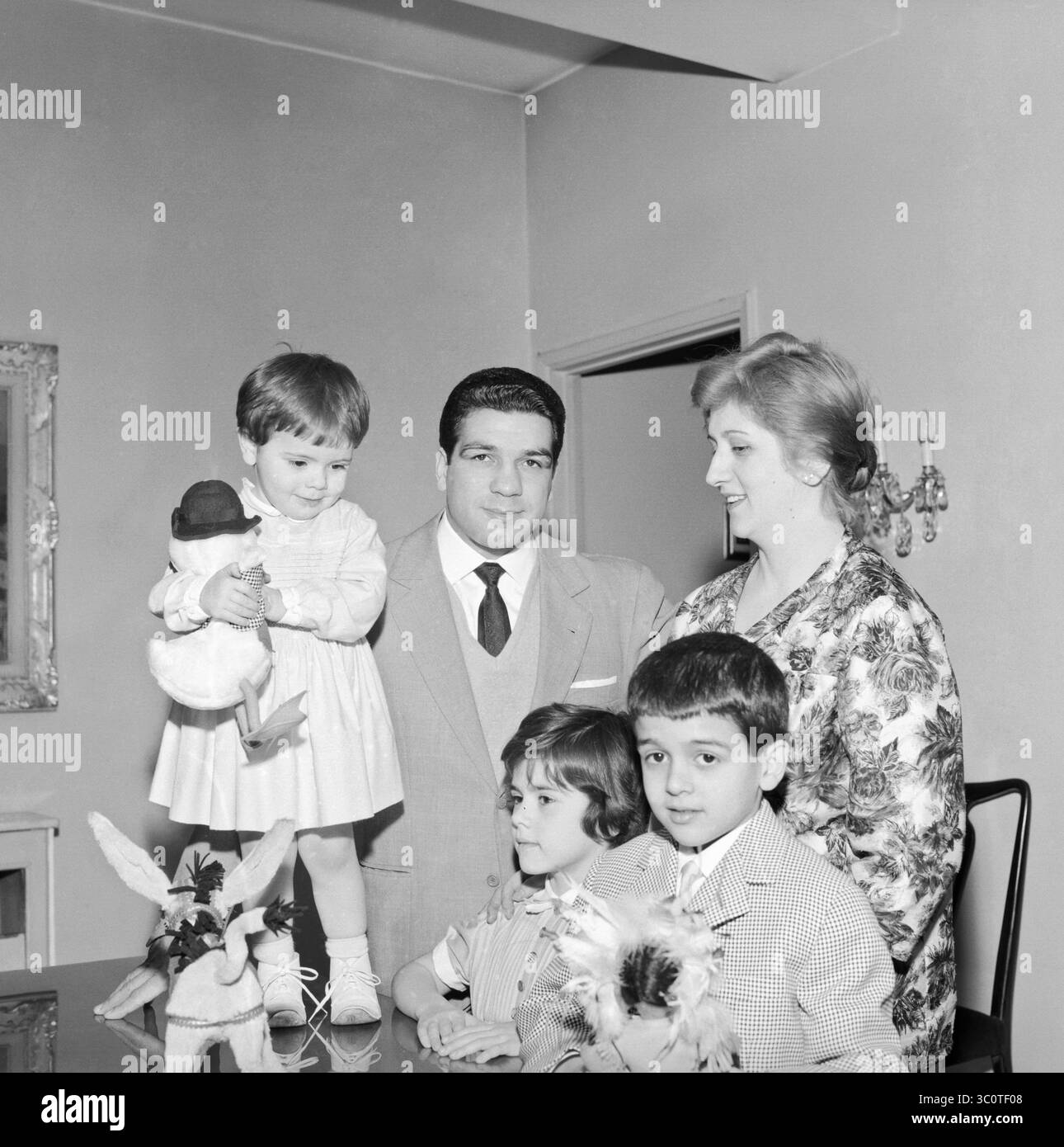 Italian boxer Duilio Loi smiling in company of his wife Grazia and ...