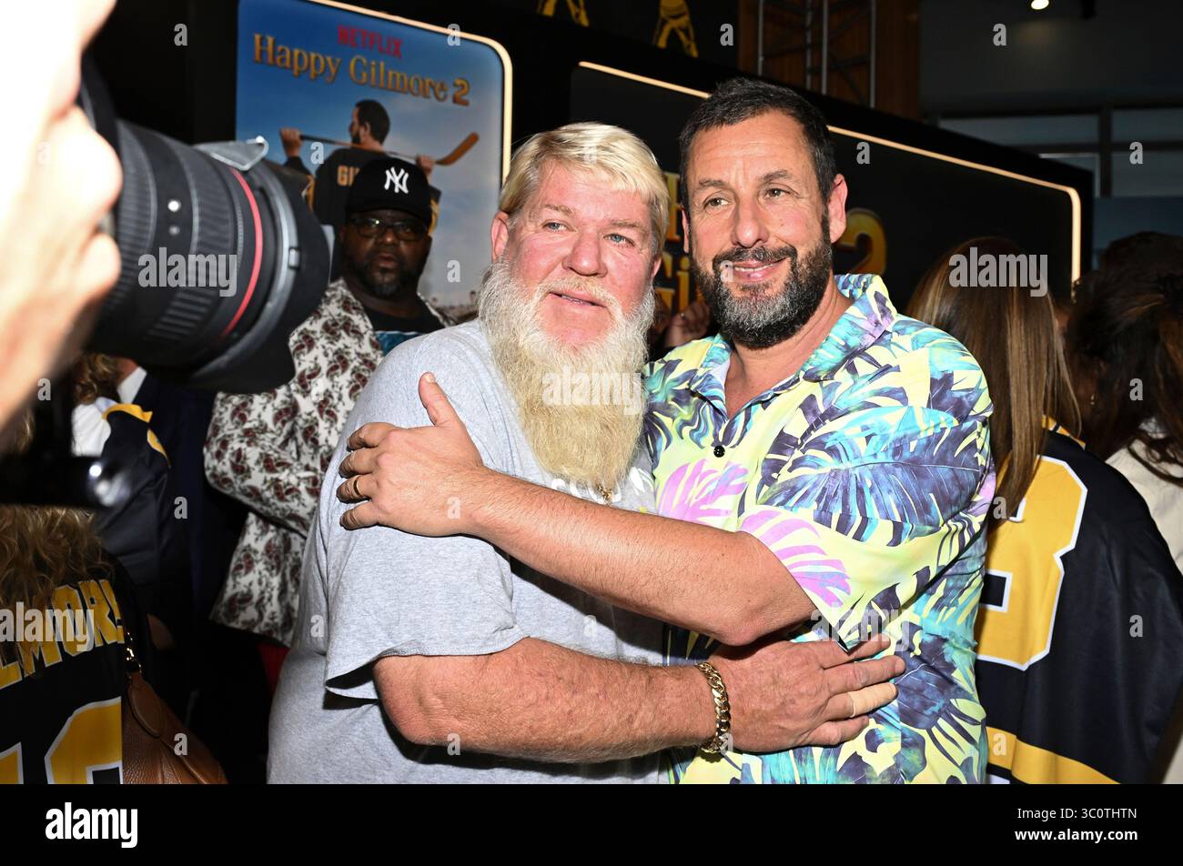 John Daly, left, and Adam Sandler attend the premiere of Netflix's ...