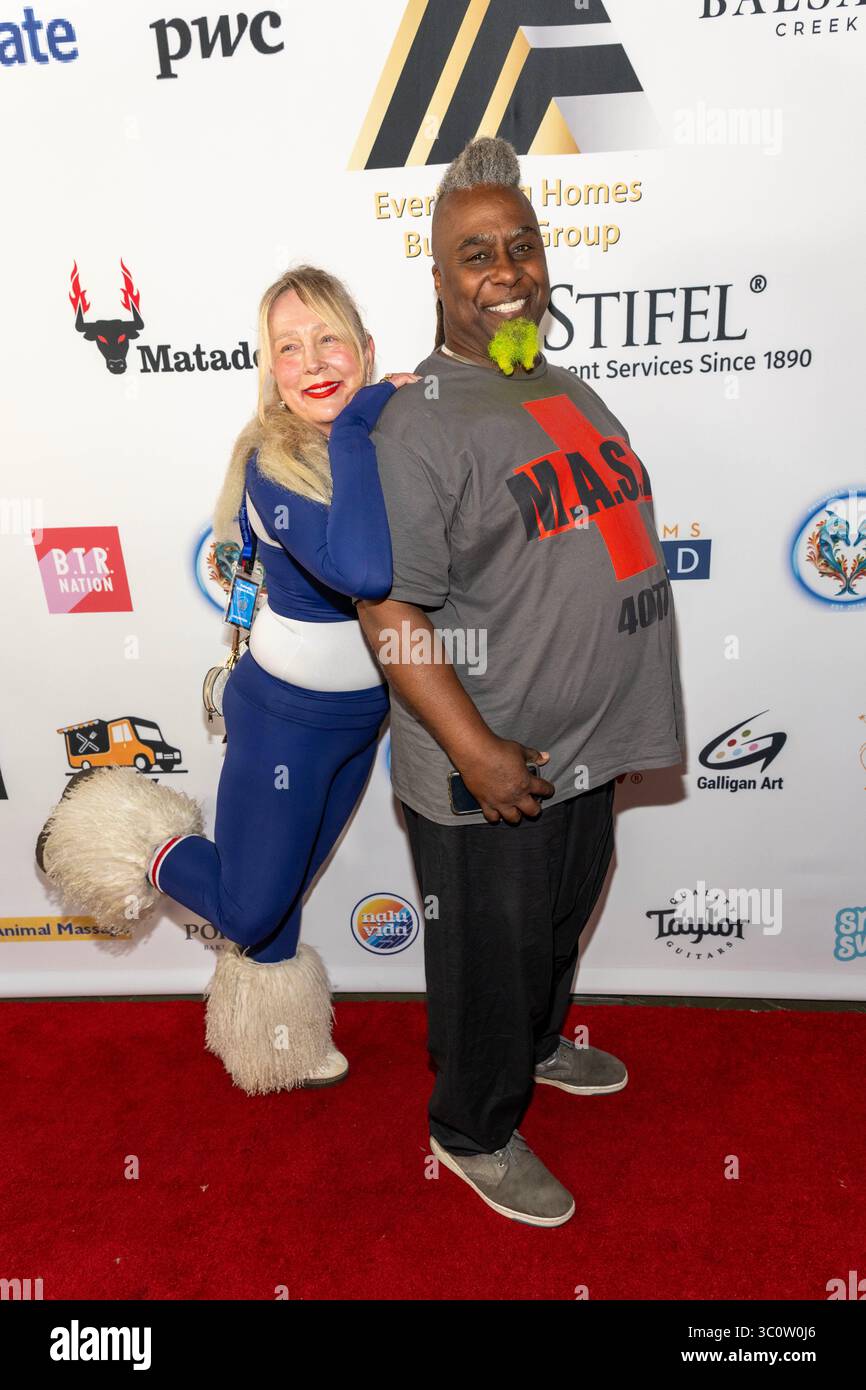 Vocalist Jon Brooks and Chrissy attend the Palisades Dolphin Strong ...