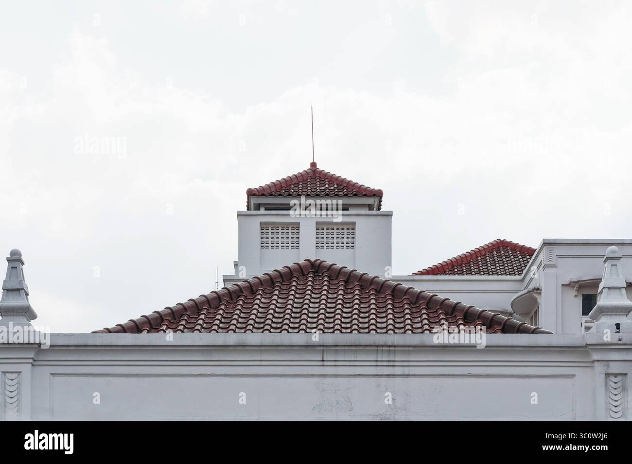 Architectural detail of a classic Dutch colonial style roof with red ...