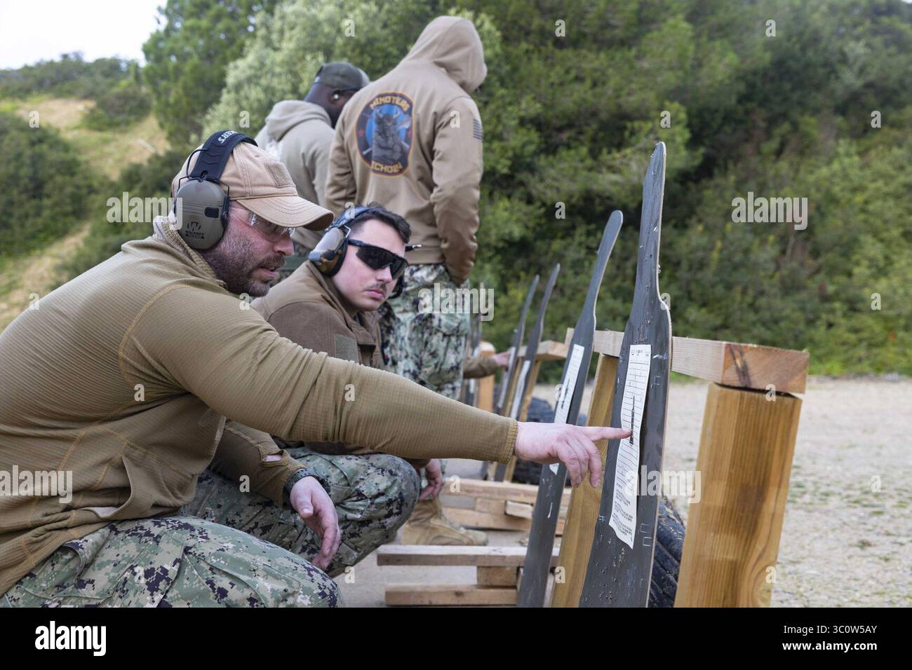 Members of Commander Task Group (CTG) 68 4 and Maritime Expeditionary ...