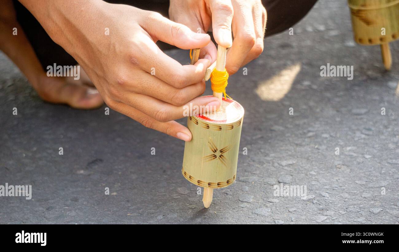 Model a spinning top, made of bamboo and wood wrapped with rope Stock ...