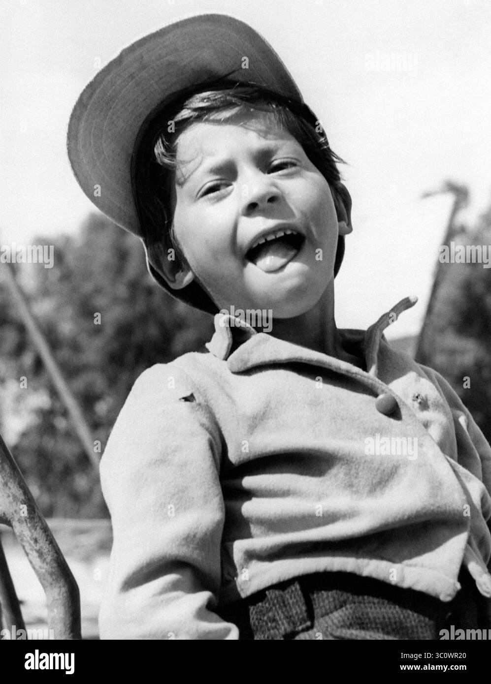 Italian actor Chicco Coluzzi making a grimace on the set of the film ...